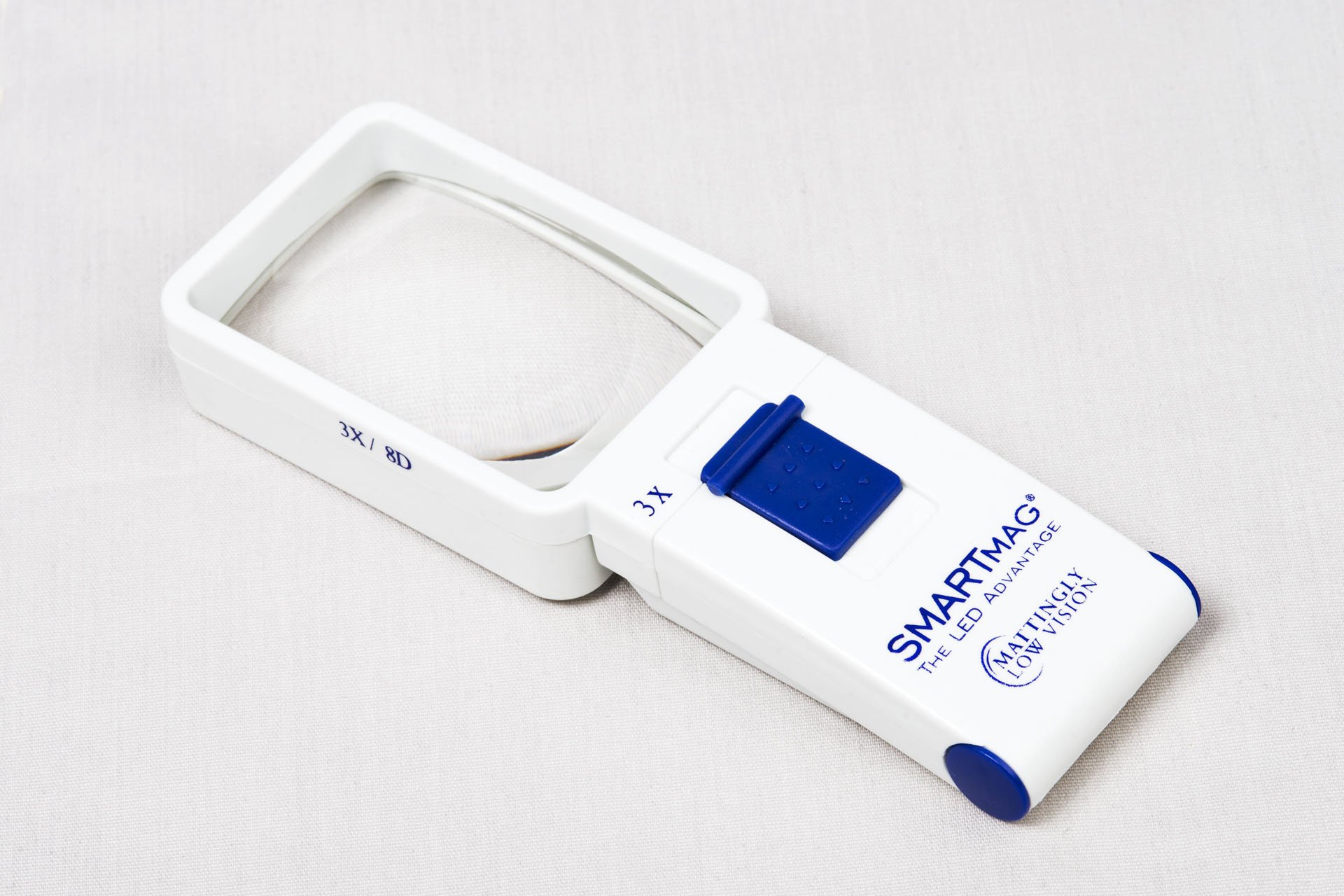 SmartMag® 3X Cool White LED Hand-Held Magnifier | Mattingly Low Vision ...