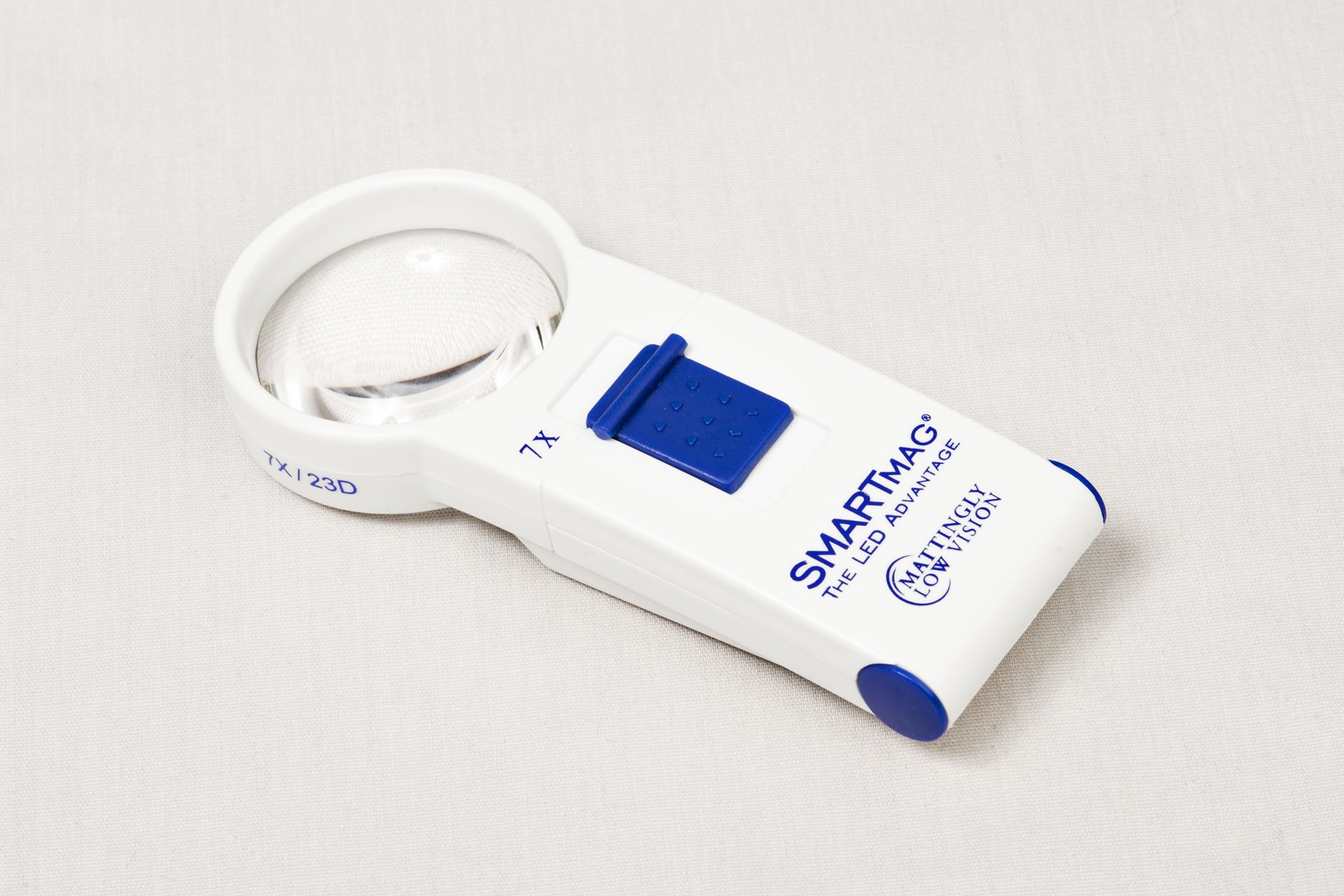 SmartMag® 7X Cool White LED Hand-Held Magnifier | Mattingly Low Vision ...